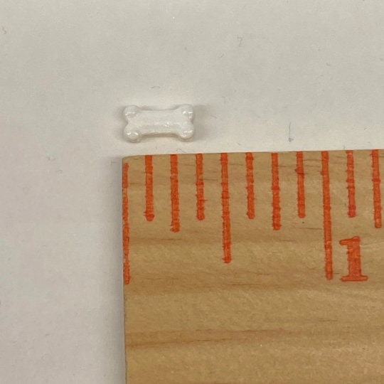 Sprinkles 1 lb Bag – Small White Bones – Cake Connection